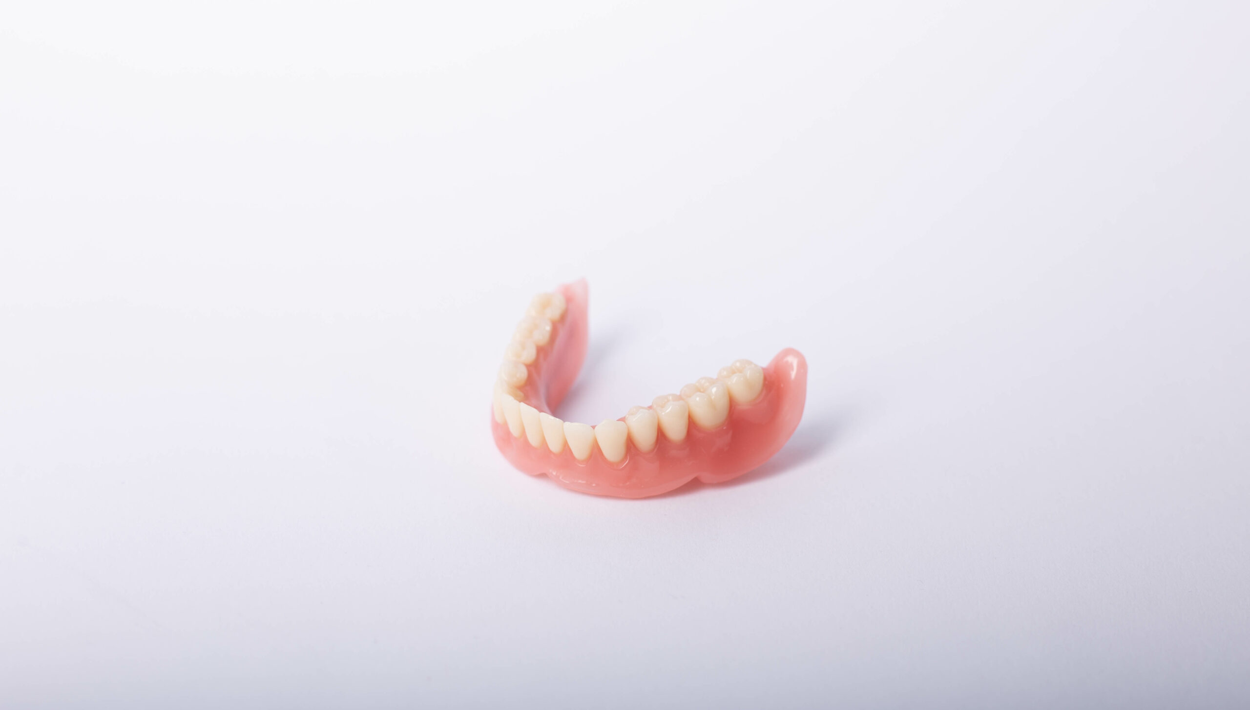 Hybrid Vs. Removable Dentures - Shrewsbury Prosthodontic